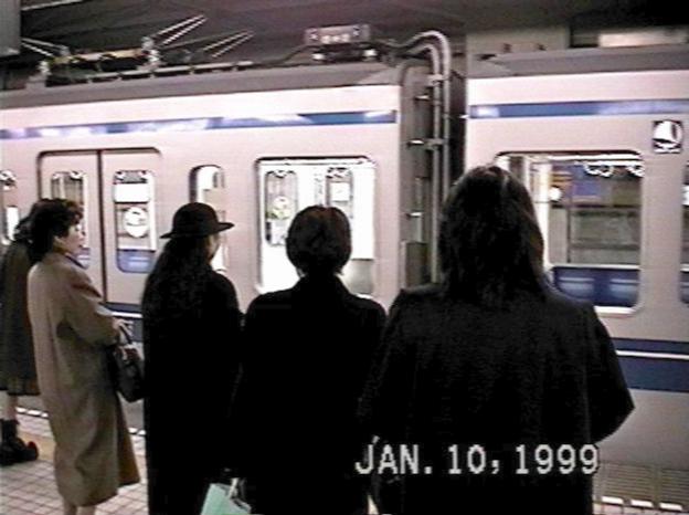 A non-rush hour view of the Tokyo subway. Not too bad on a Sunday,but ...