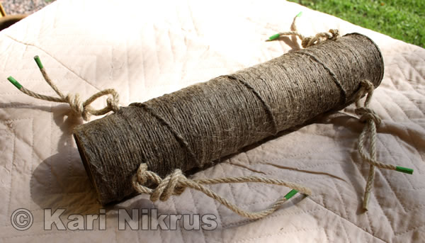 Play tube for a pet rat. Cardboard tube with french hitching.