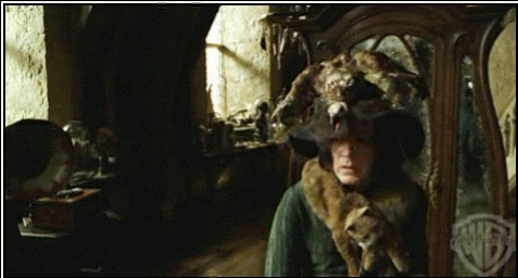 This is the classic Snape in dress scene. One should notice his ...